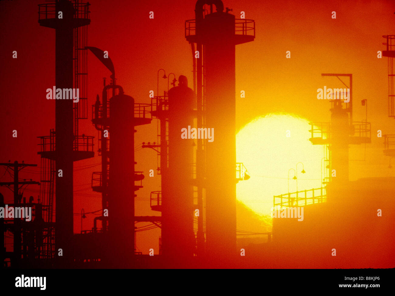 Sunset at oil refinery, California Stock Photo - Alamy