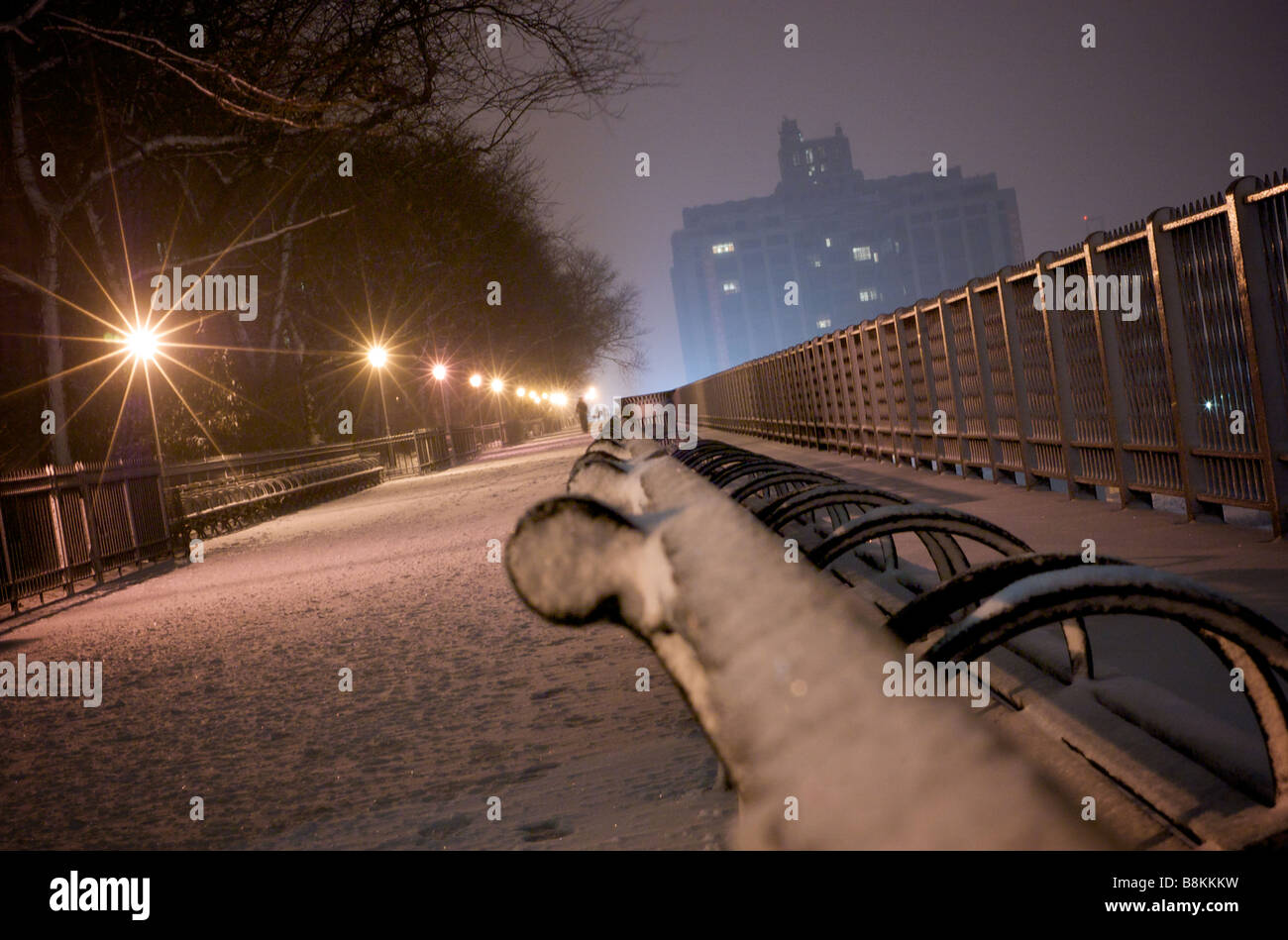 Perspective Nighttime View of Snowy Benches and Landscape at the ...