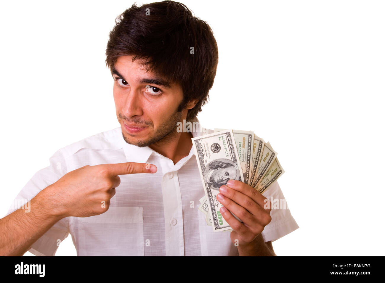 young man pointing to the money isolated on white Stock Photo - Alamy