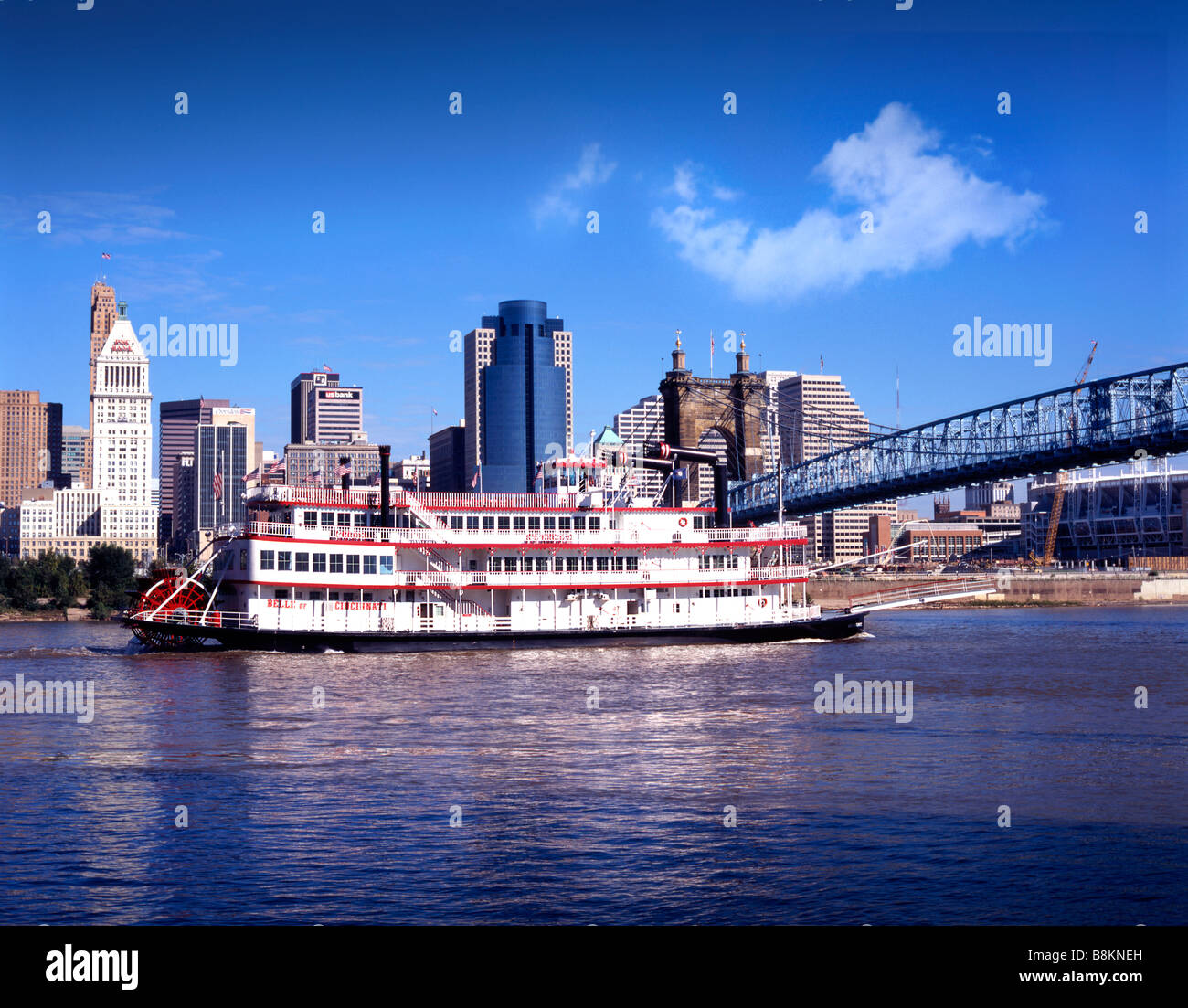 Cincinnati city skyline from across the Ohio River with paddle steamer ...