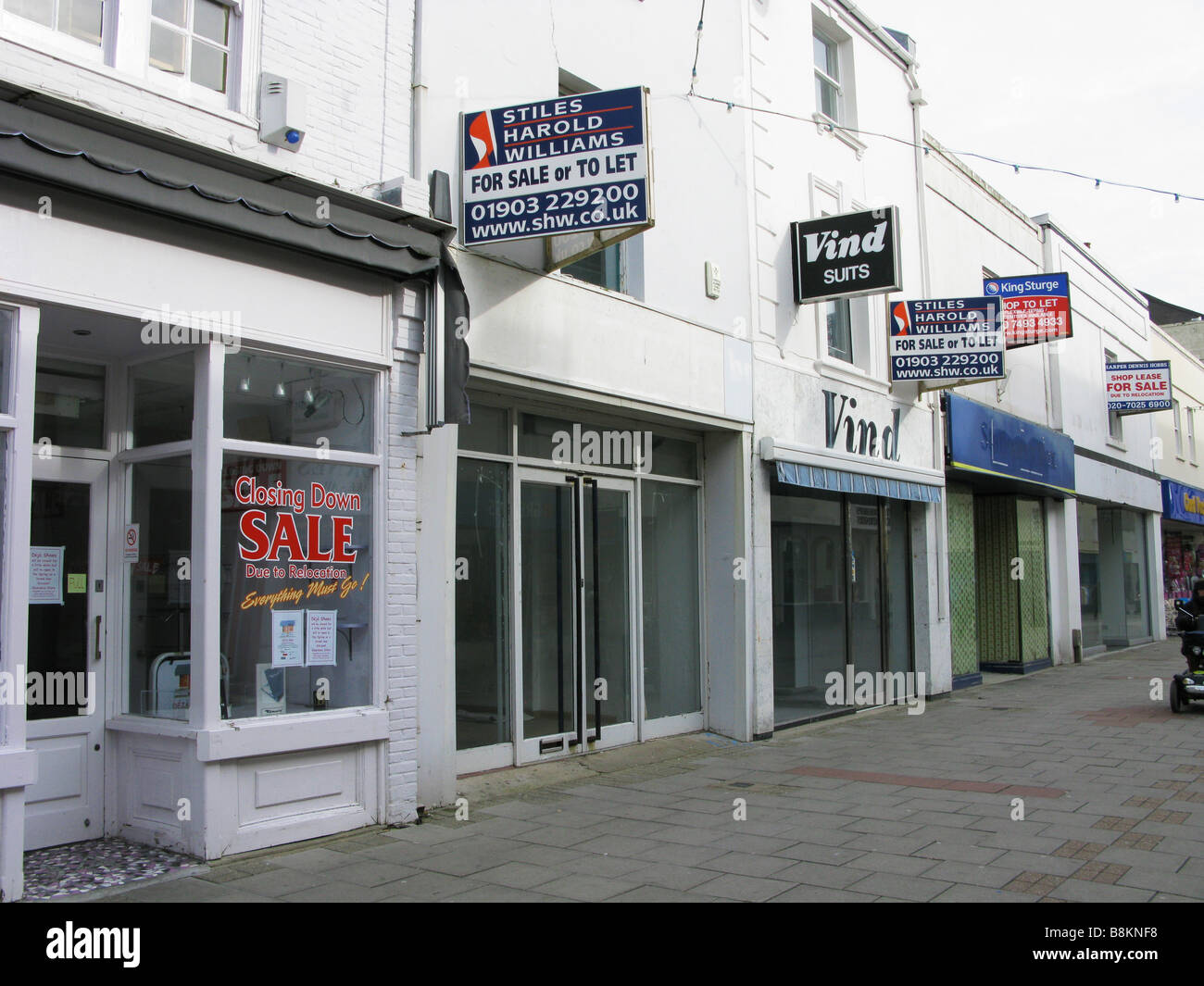 empty closed down shop units in a desolate part of Worthing shopping ...