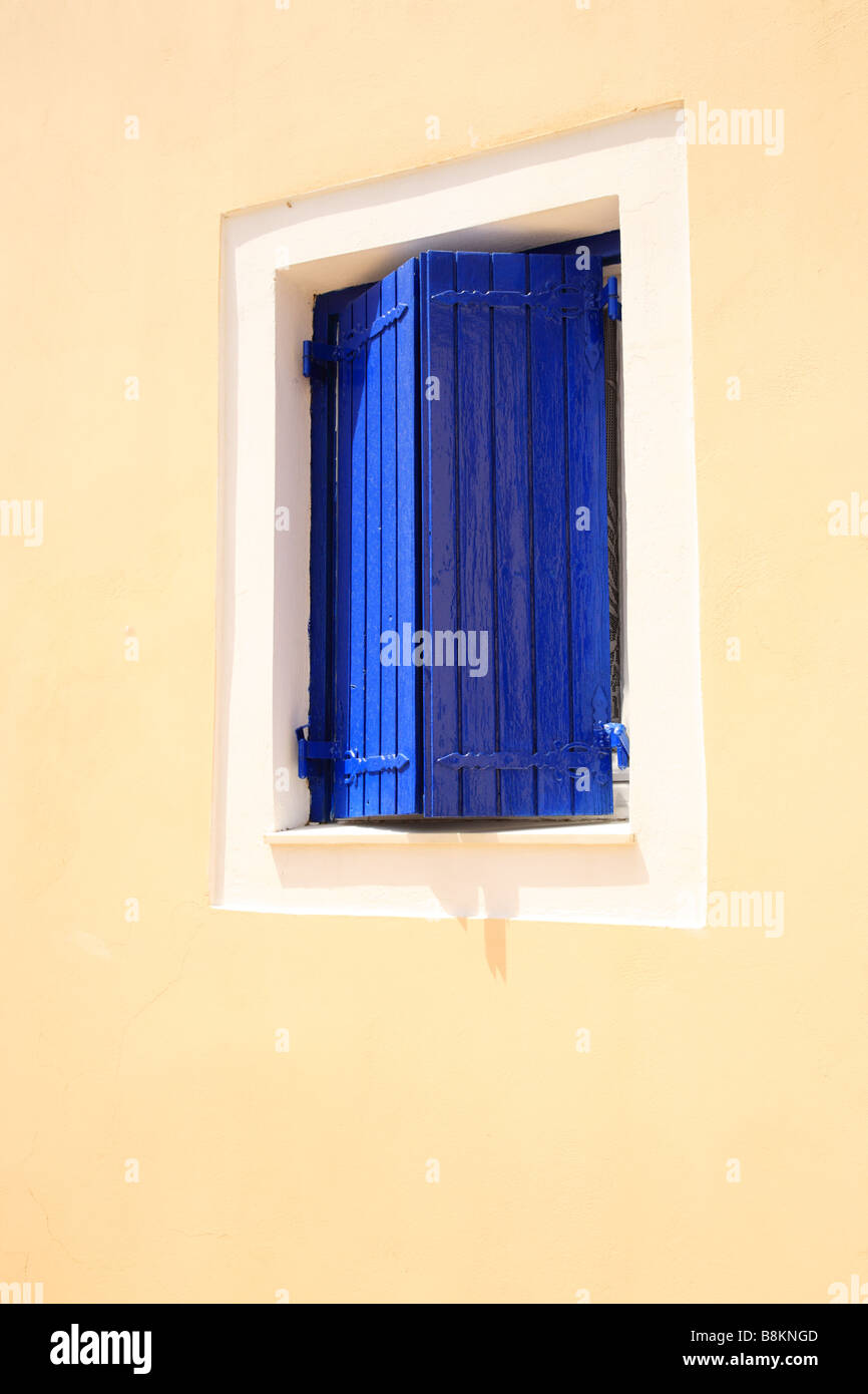 Blue window shutters in Kefalonia Greece Stock Photo - Alamy