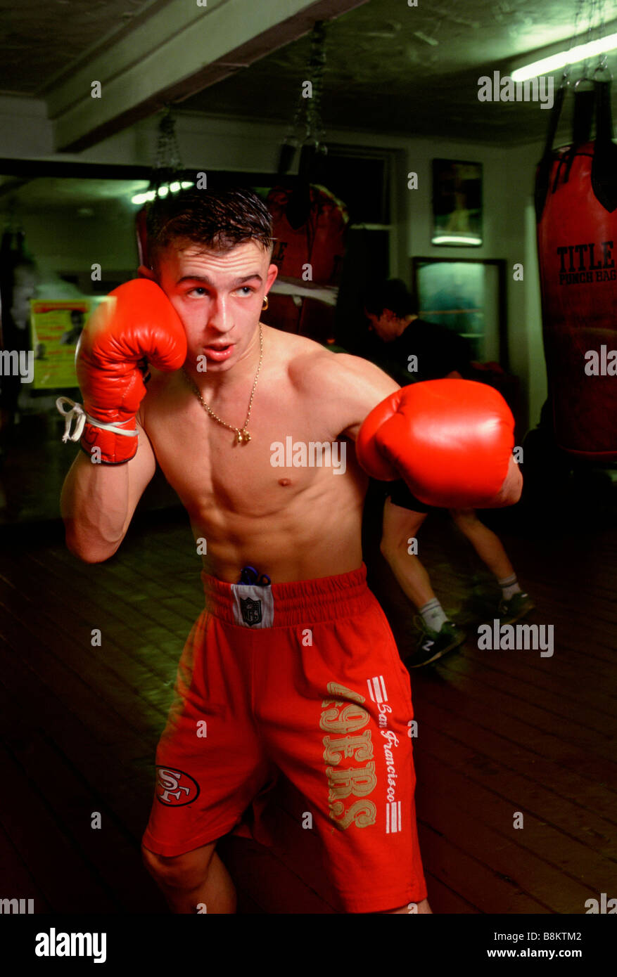 Moss Side, Manchester :A young boxer training at Phil Martin's Champ ...