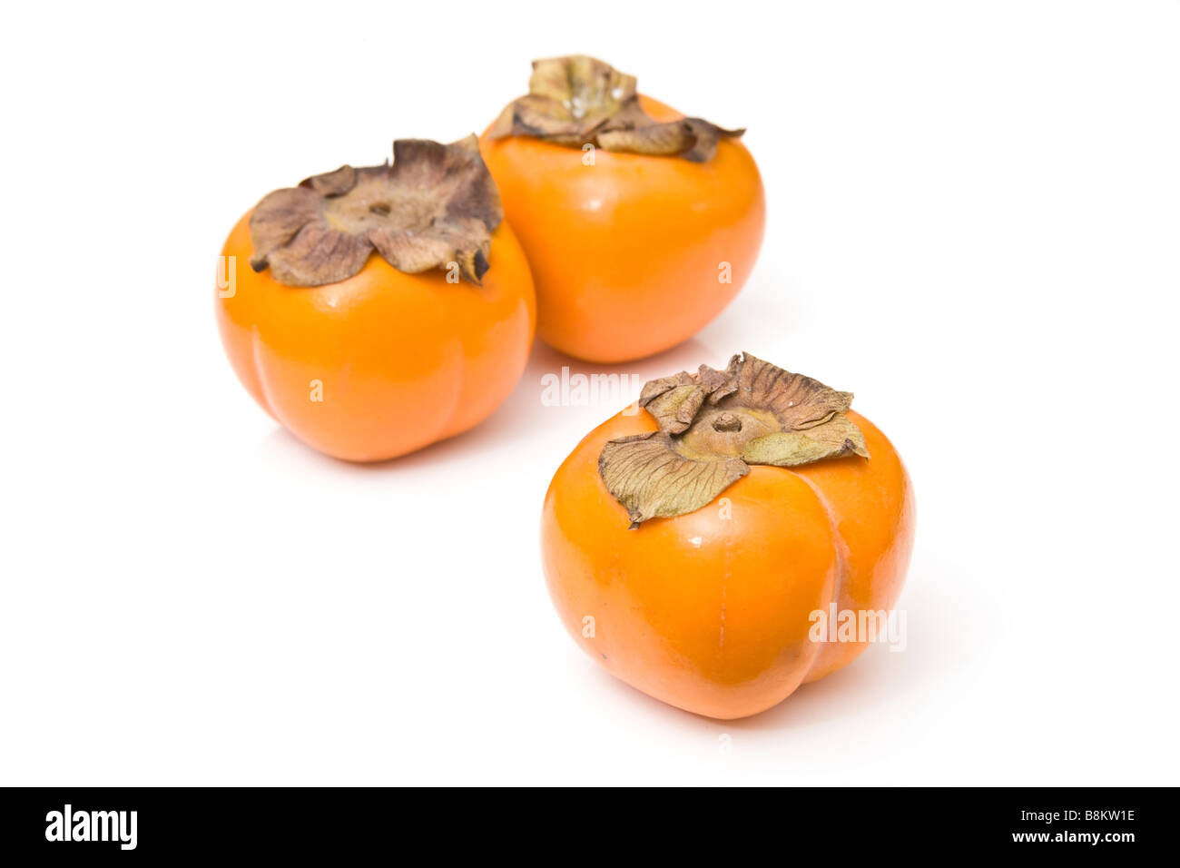 Sharon fruit or Persimon fruit isolated on a white studio background ...