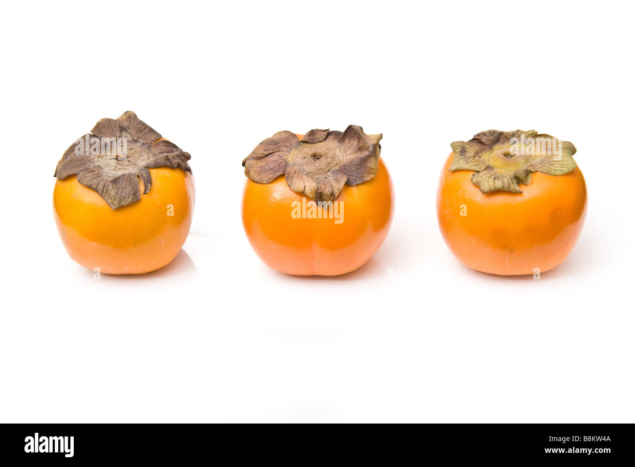 Sharon fruit or Persimon fruit isolated on a white studio background ...