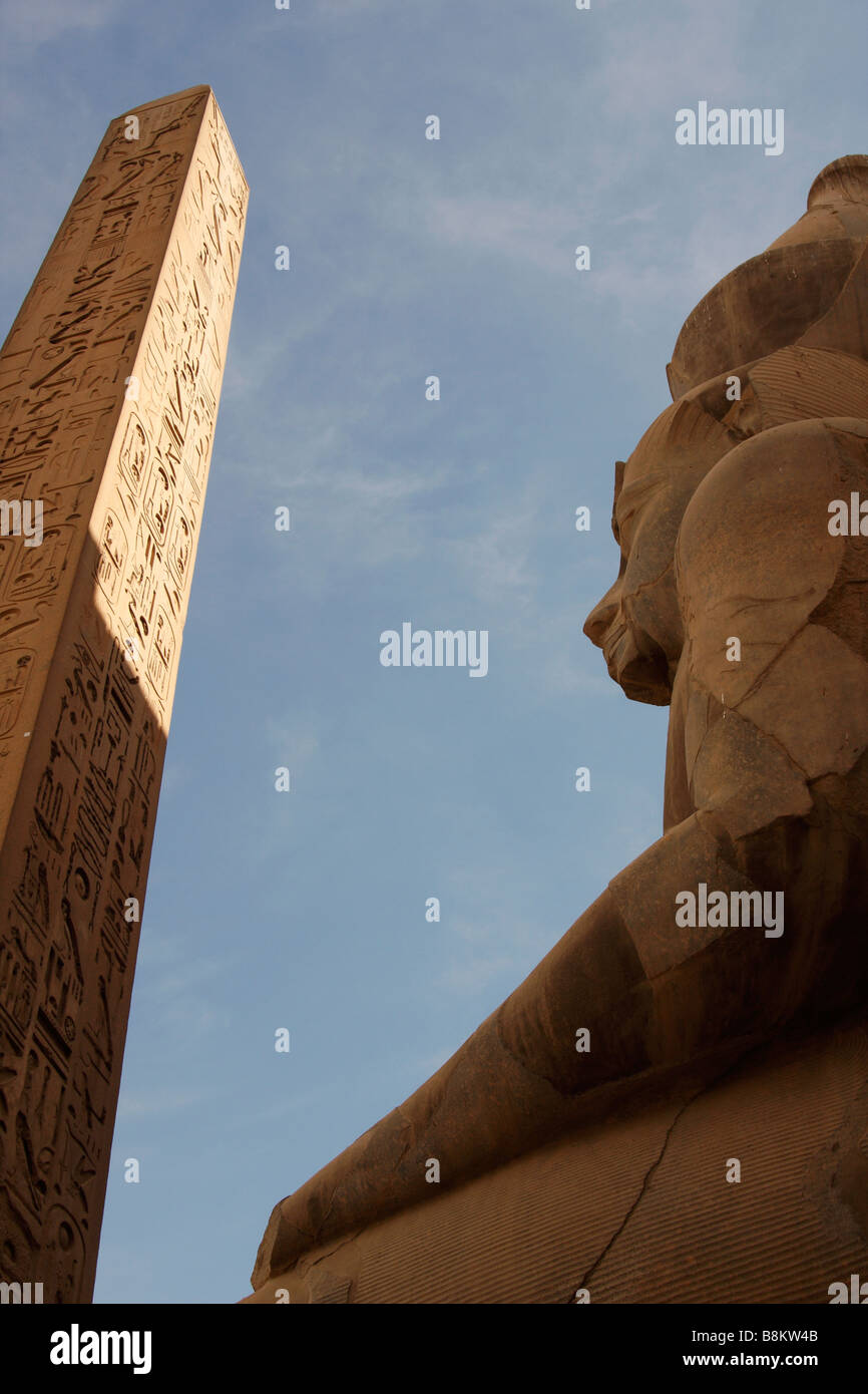 Colossus statue of Pharaoh Ramses II and obelisk carved with ...