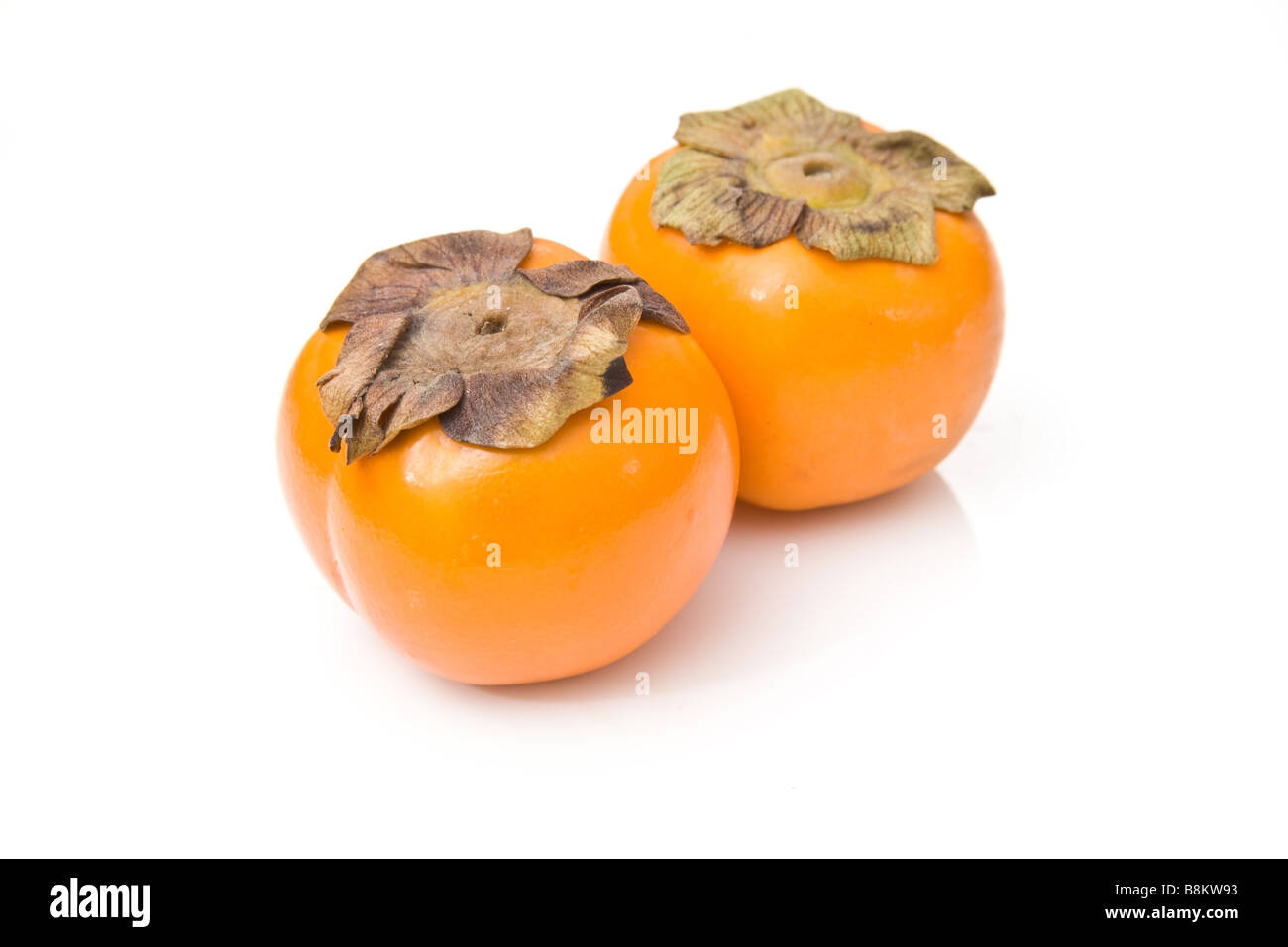 Sharon fruit or Persimon fruit isolated on a white studio background ...