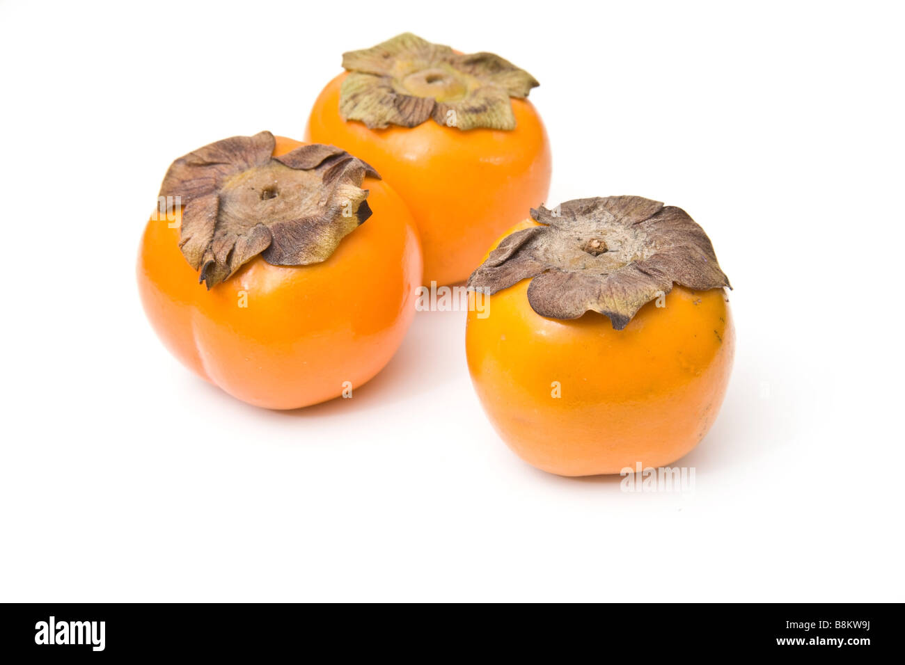 Sharon fruit or Persimon fruit isolated on a white studio background ...