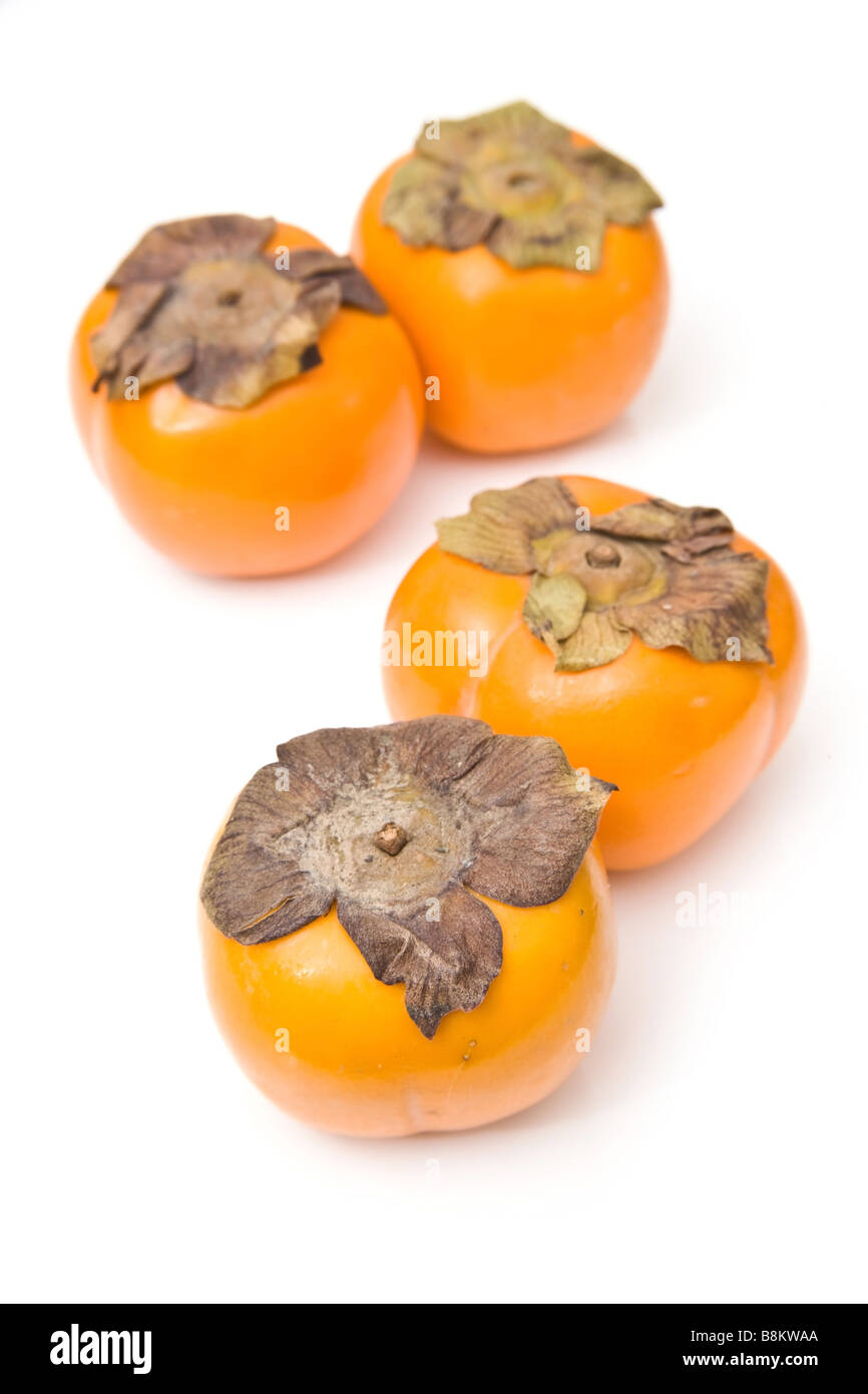 Sharon fruit or Persimon fruit isolated on a white studio background ...