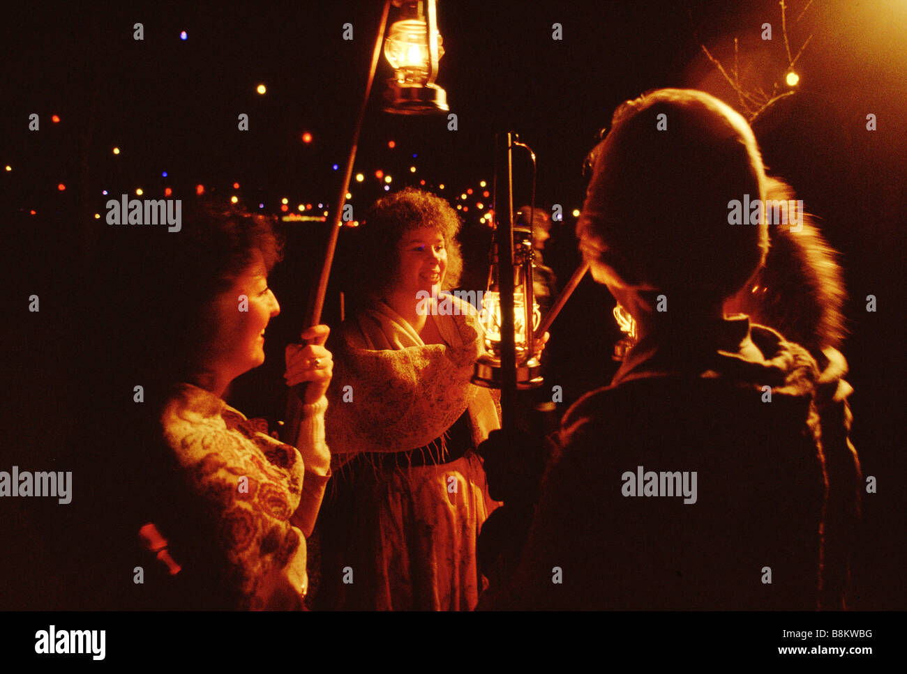 Somerset UK Wassailers sing wassail songs to apple trees in an ancient ...