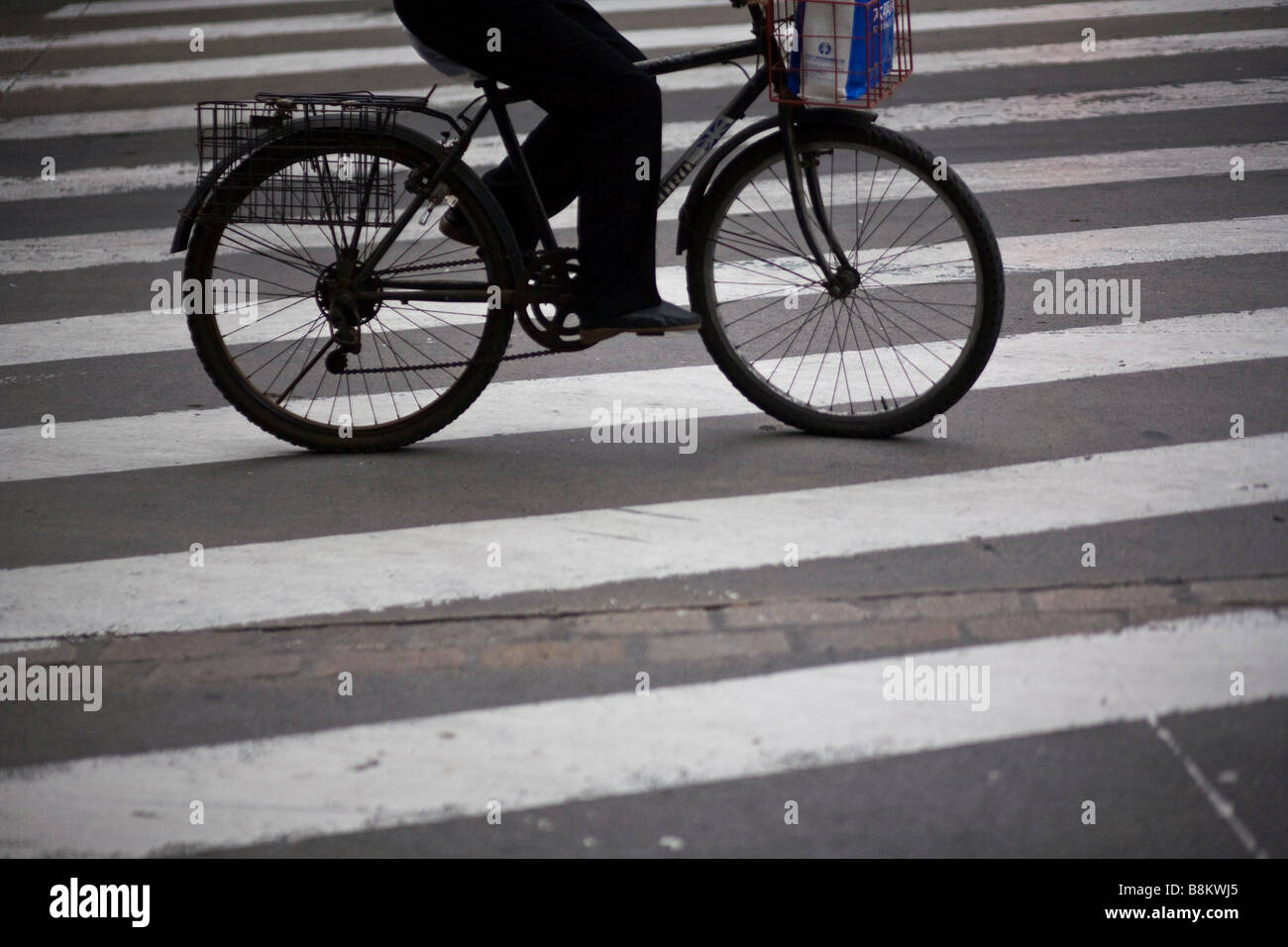 Bicyle on a zebra crossing in Shanghai, China Stock Photo - Alamy