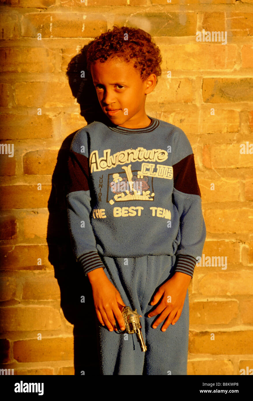 North Peckham London UK A boy plays with a toy gun on the North Peckham ...