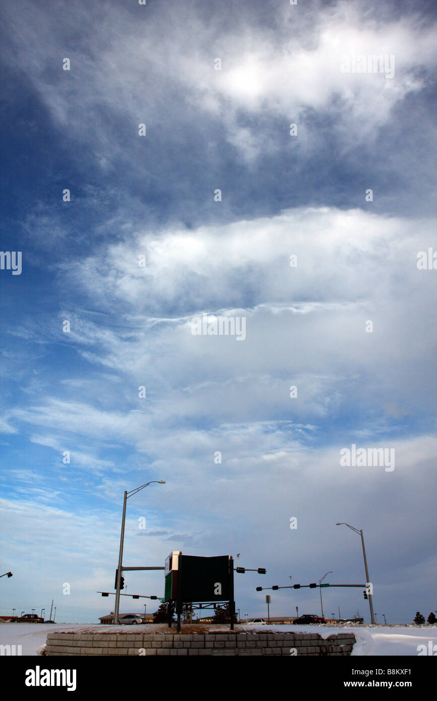 Layered clouds and the back of a modern sign Stock Photo - Alamy
