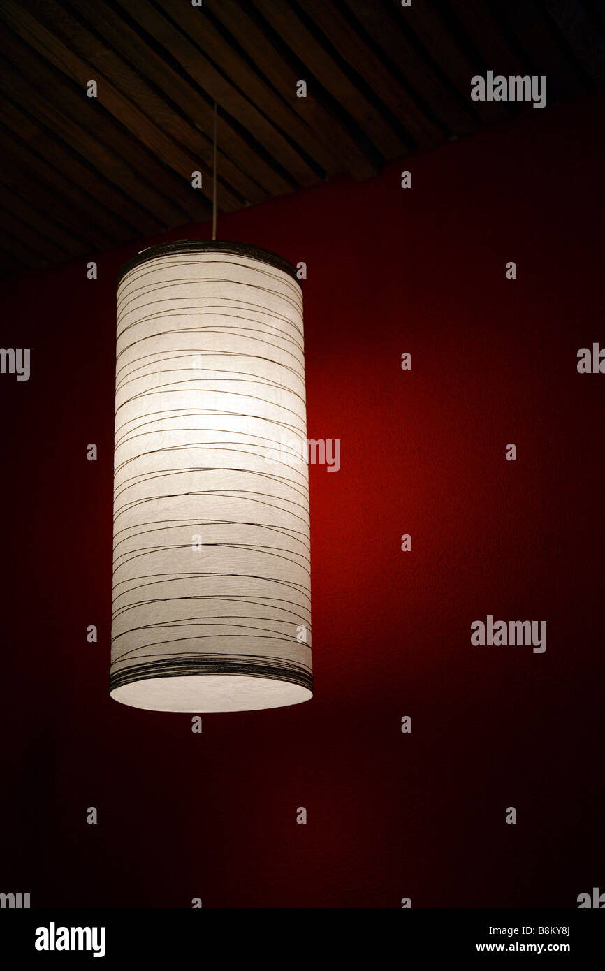 The electric fixture with a lamp shade in a room Stock Photo - Alamy