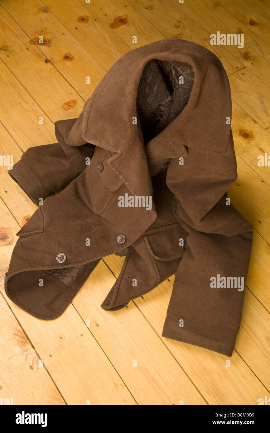 Coat on the floor Stock Photo - Alamy