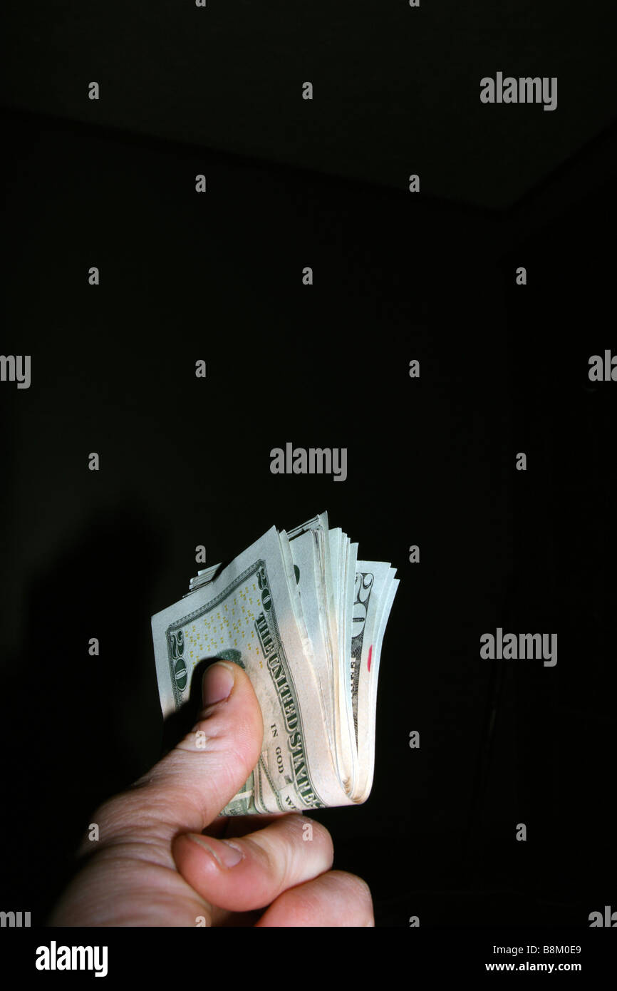 Hand holding 20 dollar bills hi-res stock photography and images - Alamy