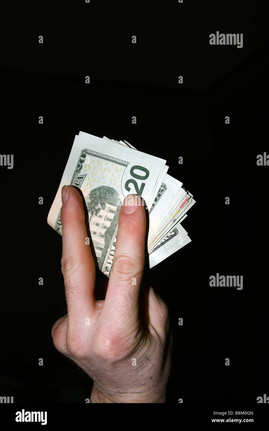 20 dollar bills hand hi-res stock photography and images - Alamy