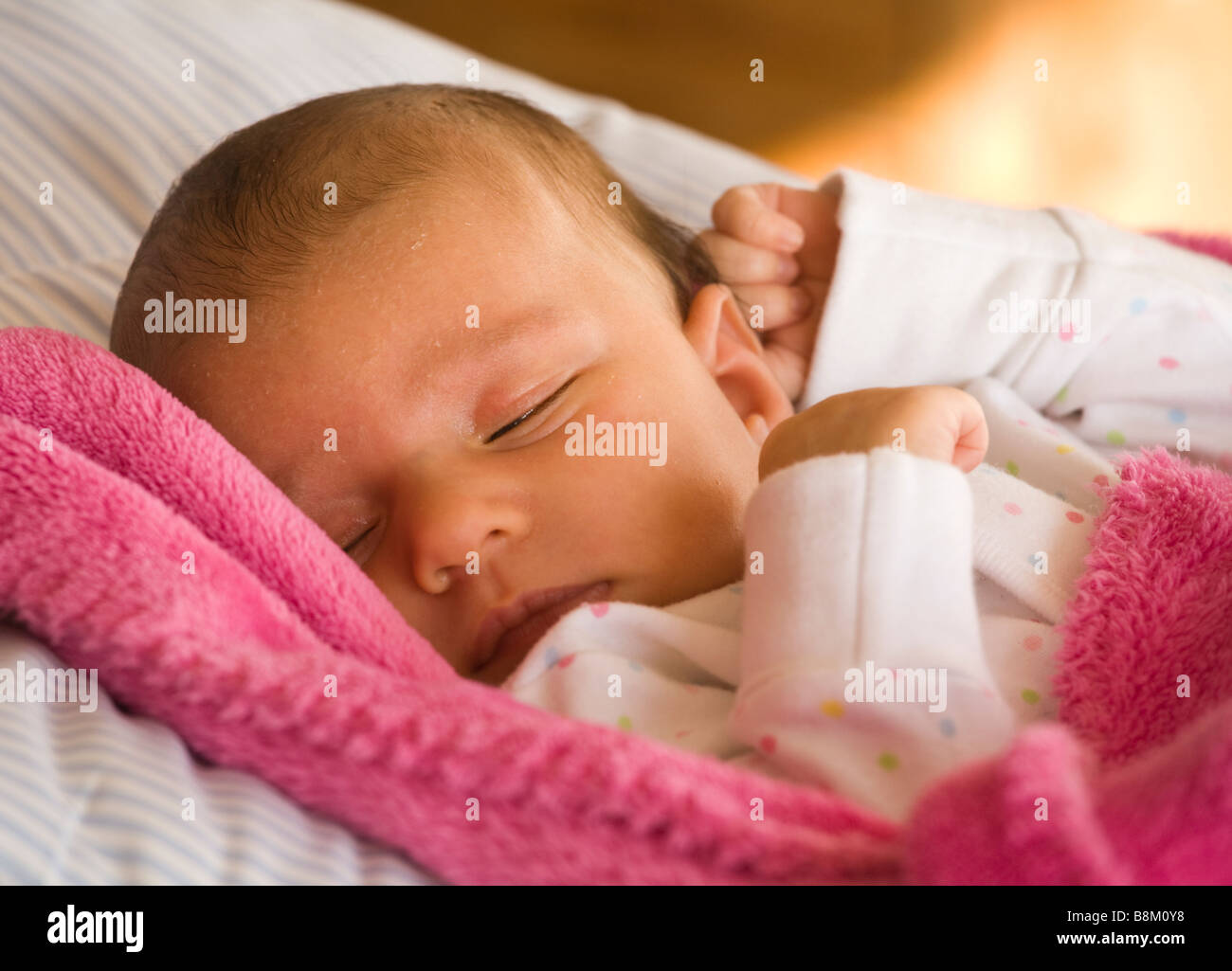 Five week old baby girl asleep Stock Photo - Alamy
