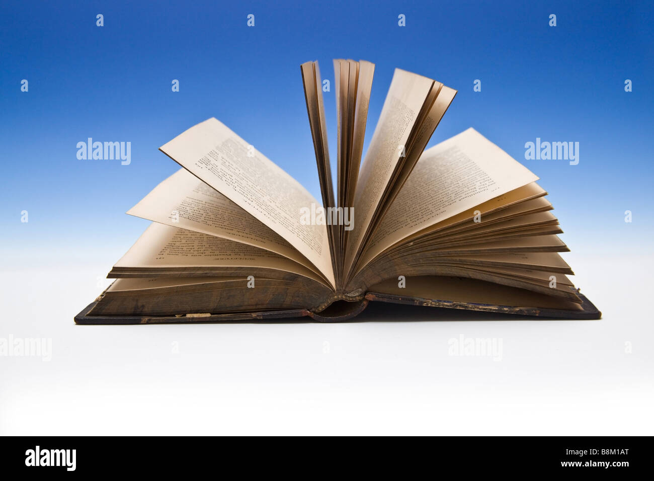 Open hardback book Stock Photo - Alamy