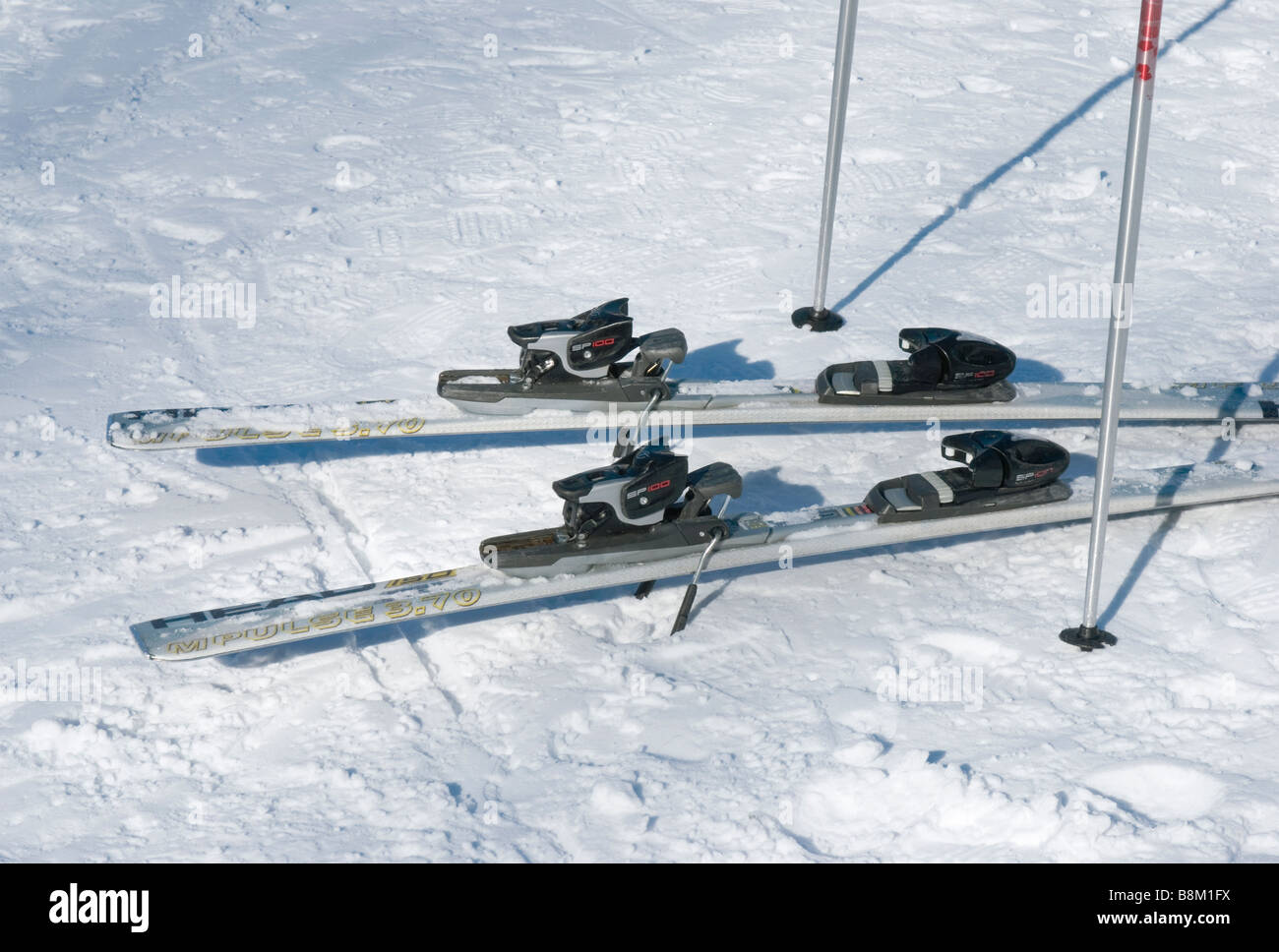 Skis And Poles Stuck In Snow Stock Photo - Alamy