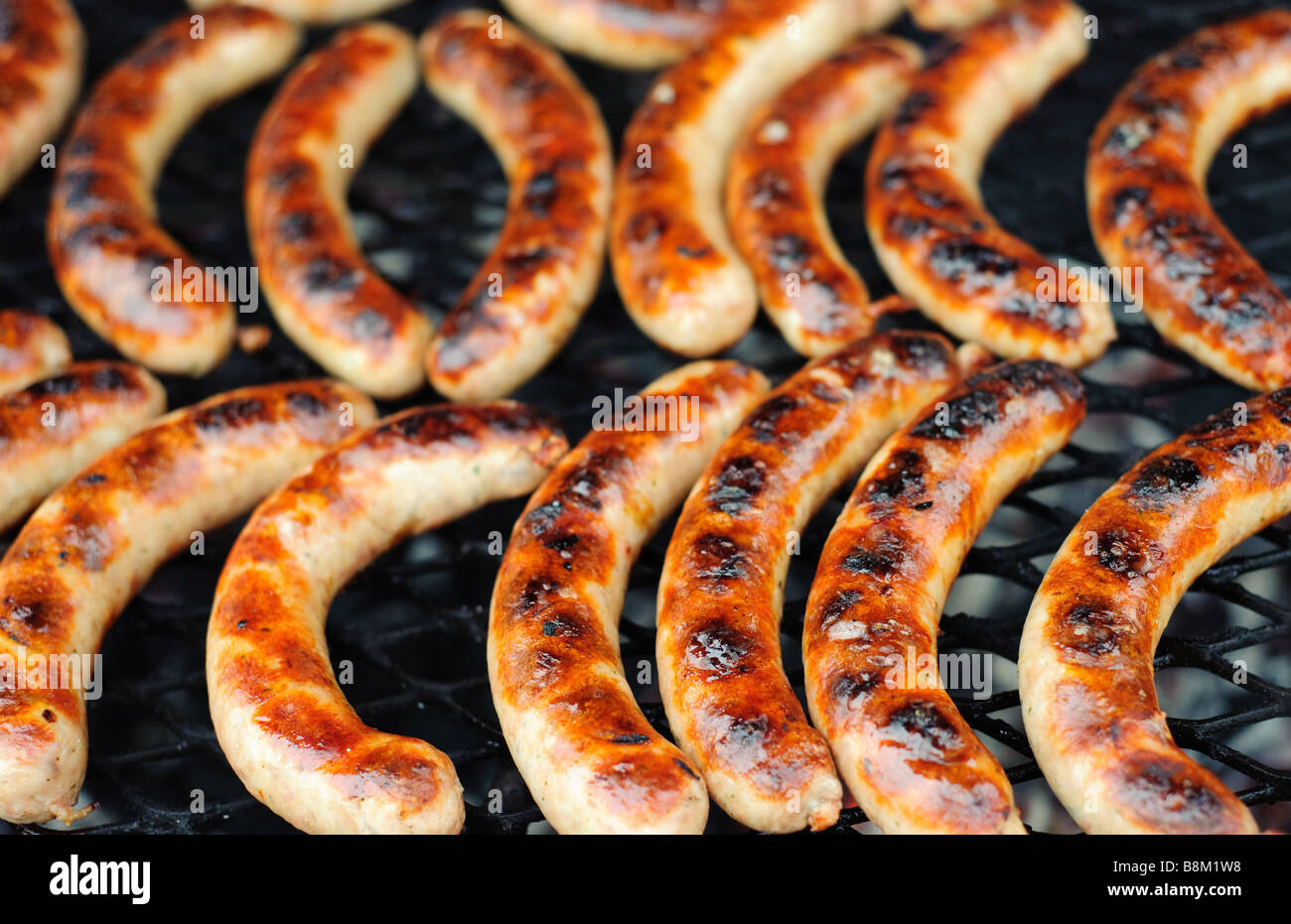 hot sausages on the barbecue Stock Photo - Alamy