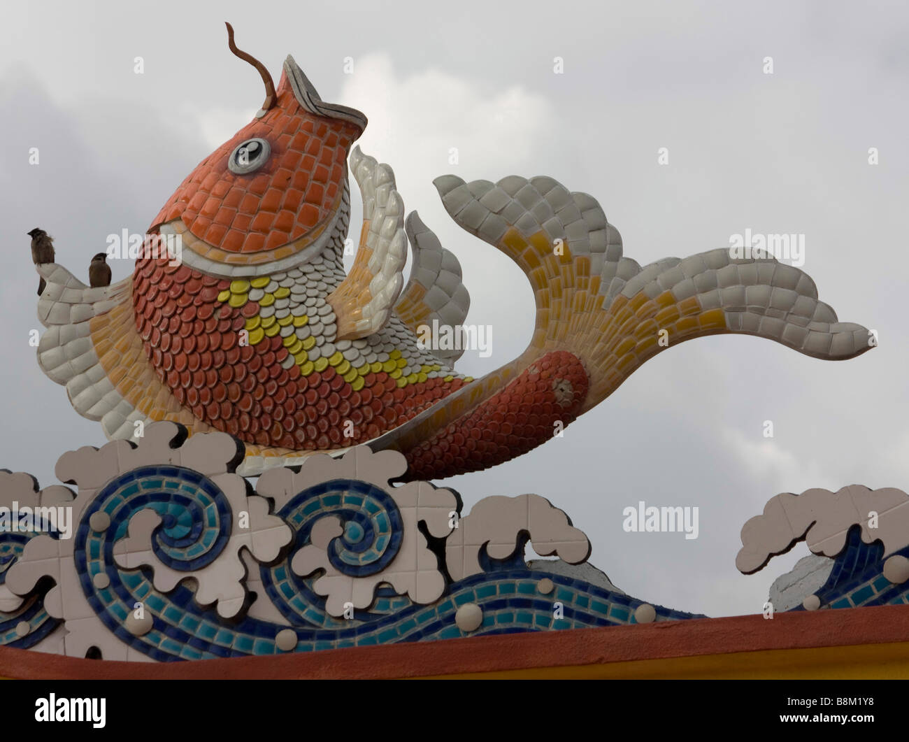 Statue of fish on roof of a temple at butterworth penang malaysia Stock ...