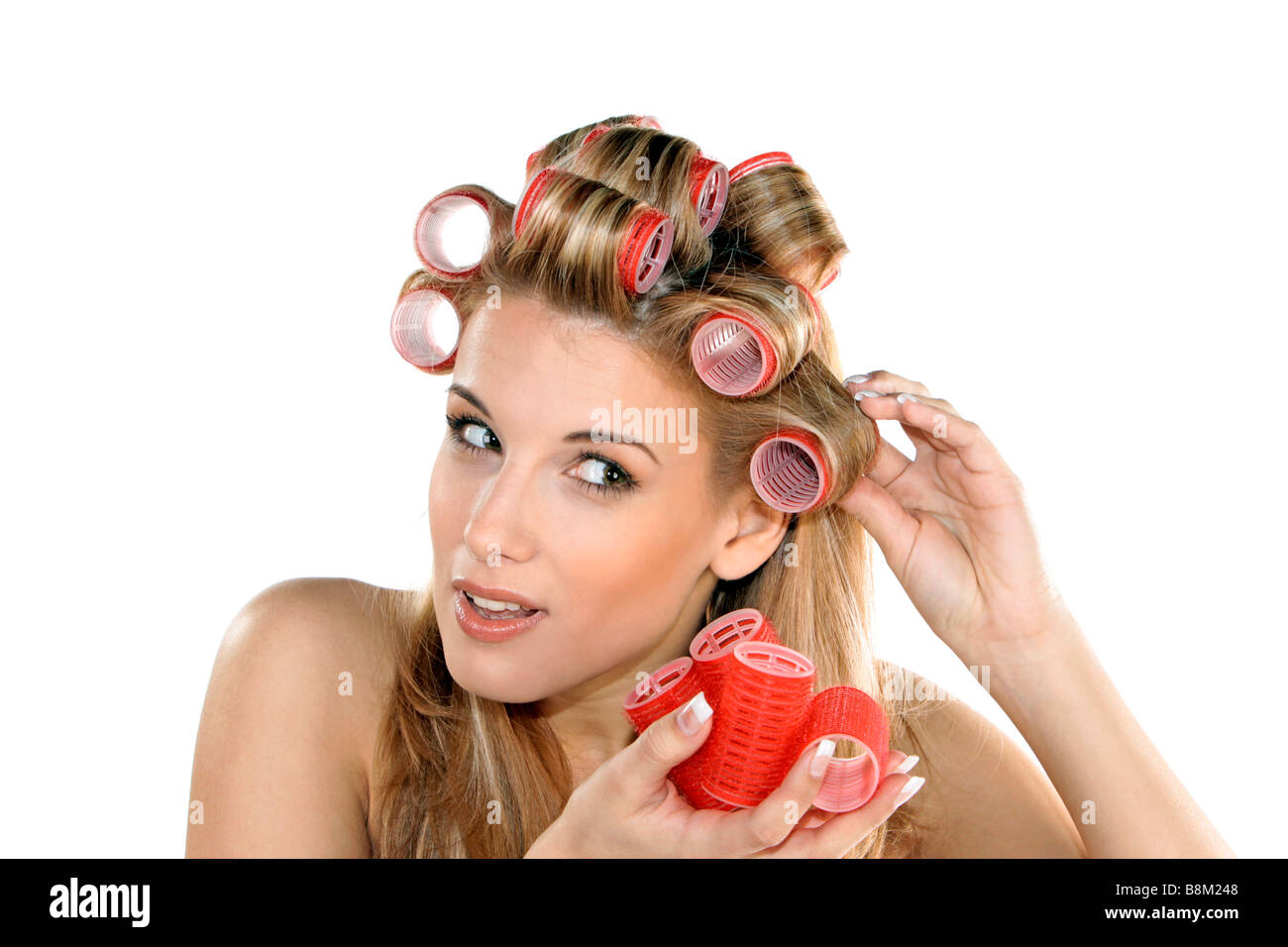 beautiful girl with hair curlers Stock Photo - Alamy