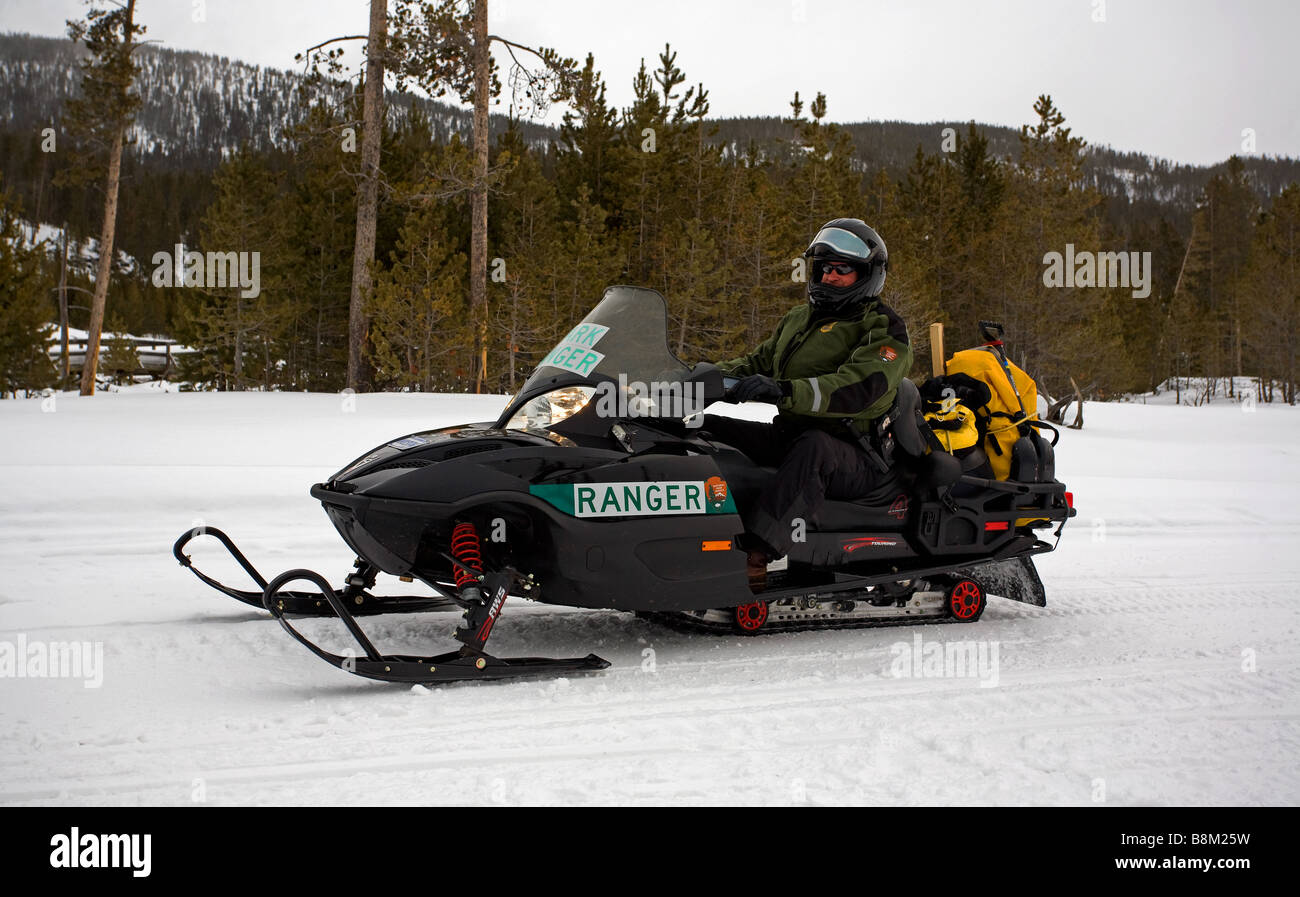Park Ranger in snowmobile Yellowstone National Park Stock Photo - Alamy