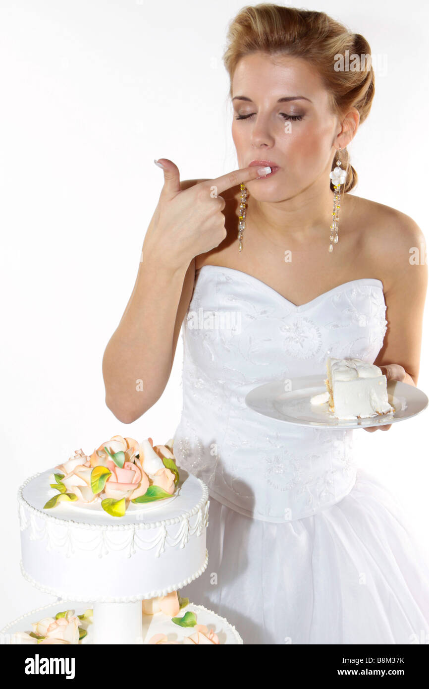 Beautiful happy young woman eating Cut Out Stock Images & Pictures - Alamy