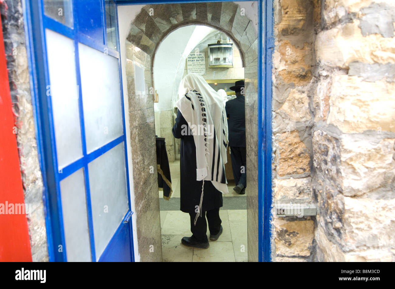 Jewish men study Torah scripture together in the Rashbi Grave in ...