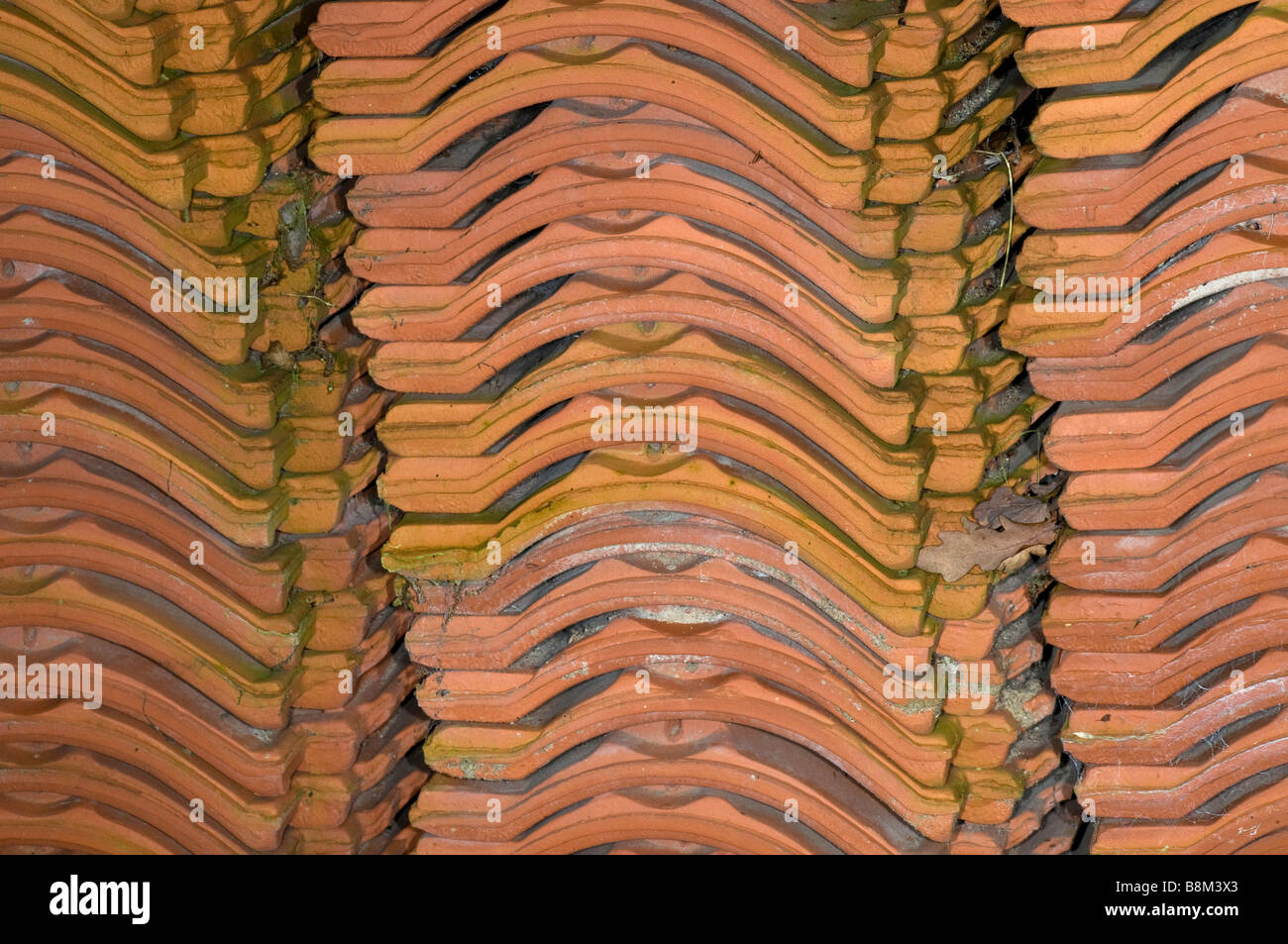Stack of clay roof tiles Stock Photo - Alamy