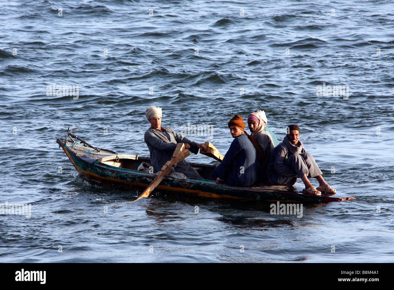 Egyptians rowing across the River Nile in Egypt Stock Photo - Alamy