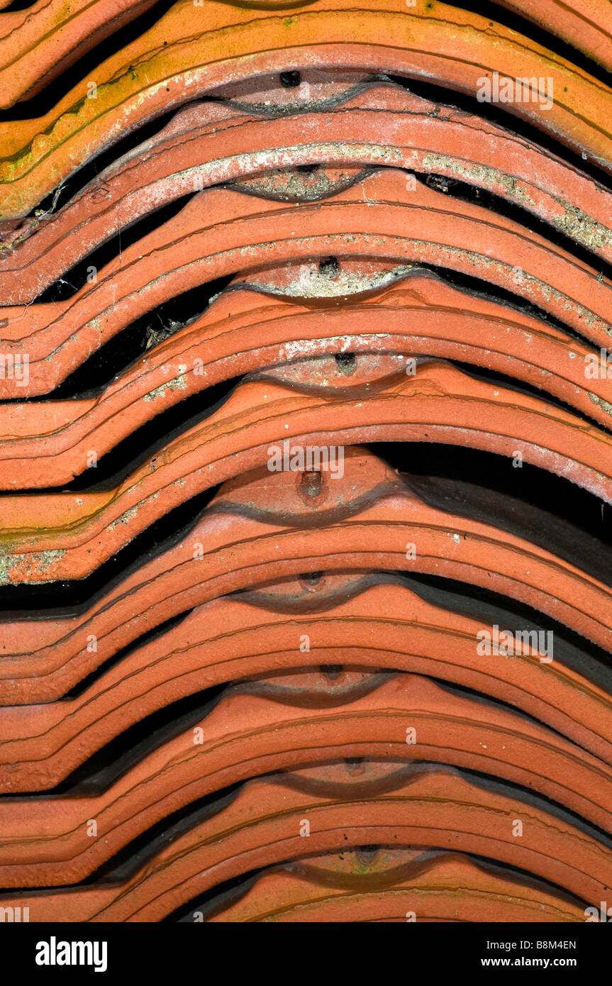 Stack of clay roof tiles Stock Photo - Alamy