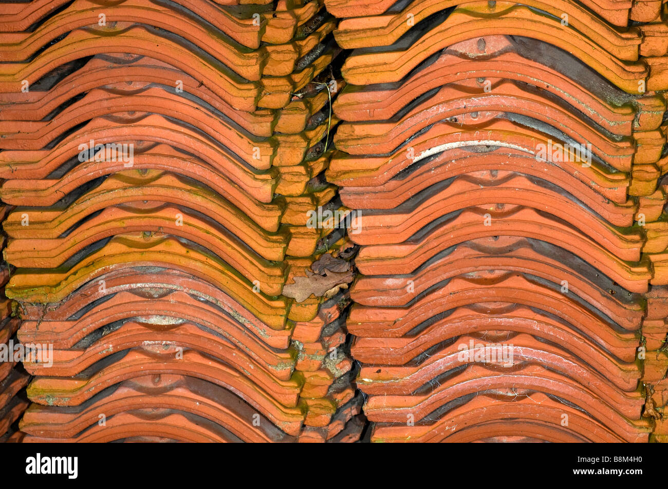 Stack of clay roof tiles Stock Photo - Alamy
