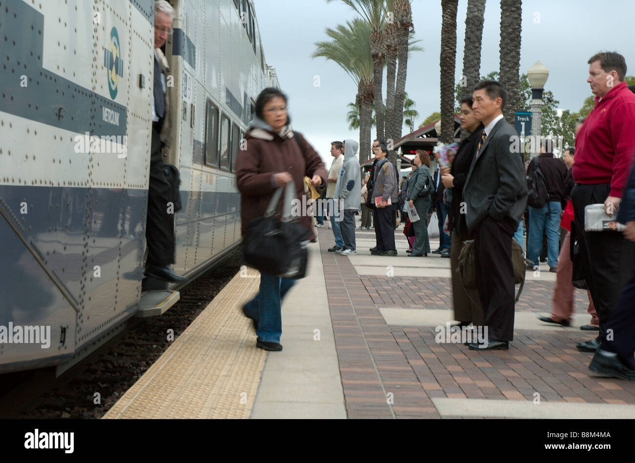 Passengers exiting a train at the Fullerton train station, Fullerton ...