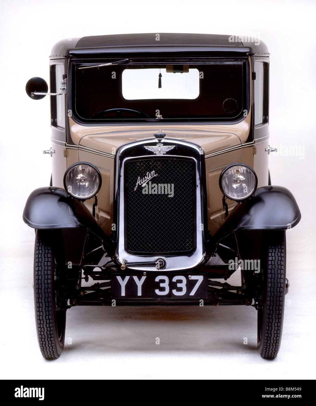A 1920s Austin Seven on a white studio background head on Stock Photo ...