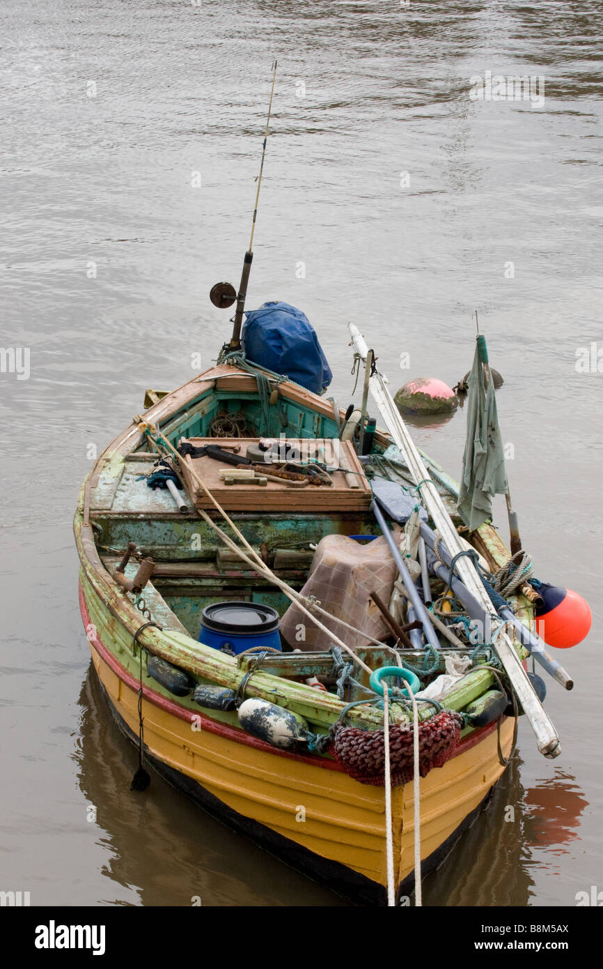 Traditional open fishing boat in Whitby harbour Stock Photo - Alamy