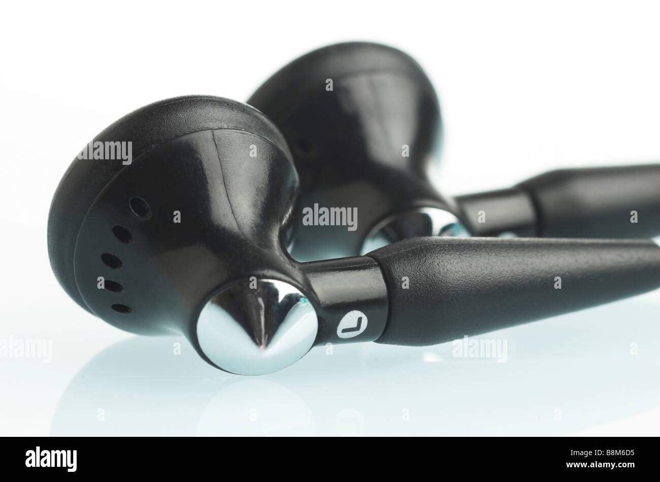 In the ear headphones Stock Photo - Alamy
