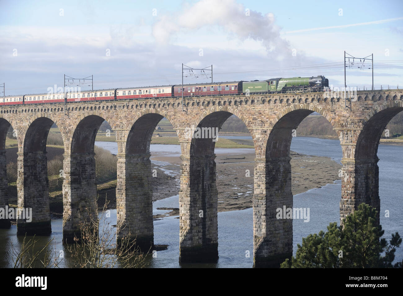 Newly built steam train, Tornado, crossing the Royal Border Bridge at ...