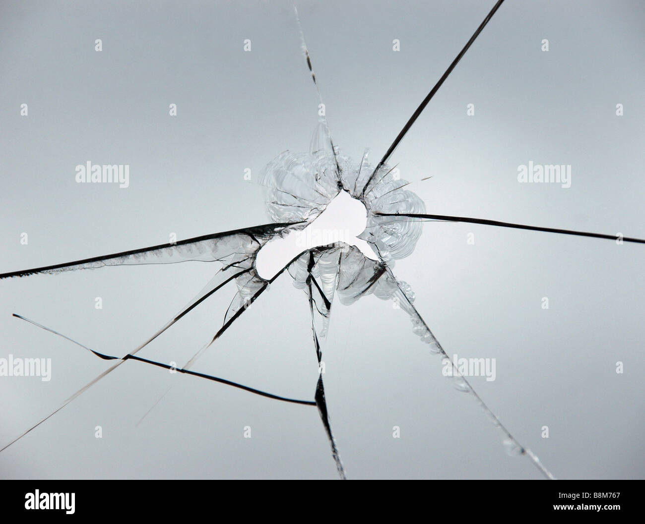 A broken and cracked window Stock Photo - Alamy