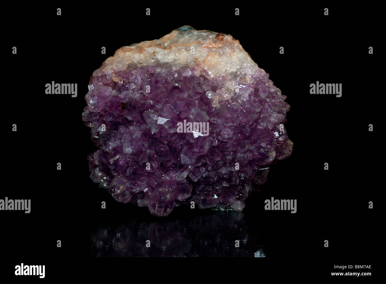 Amethyst Geode on black background Stock Photo - Alamy