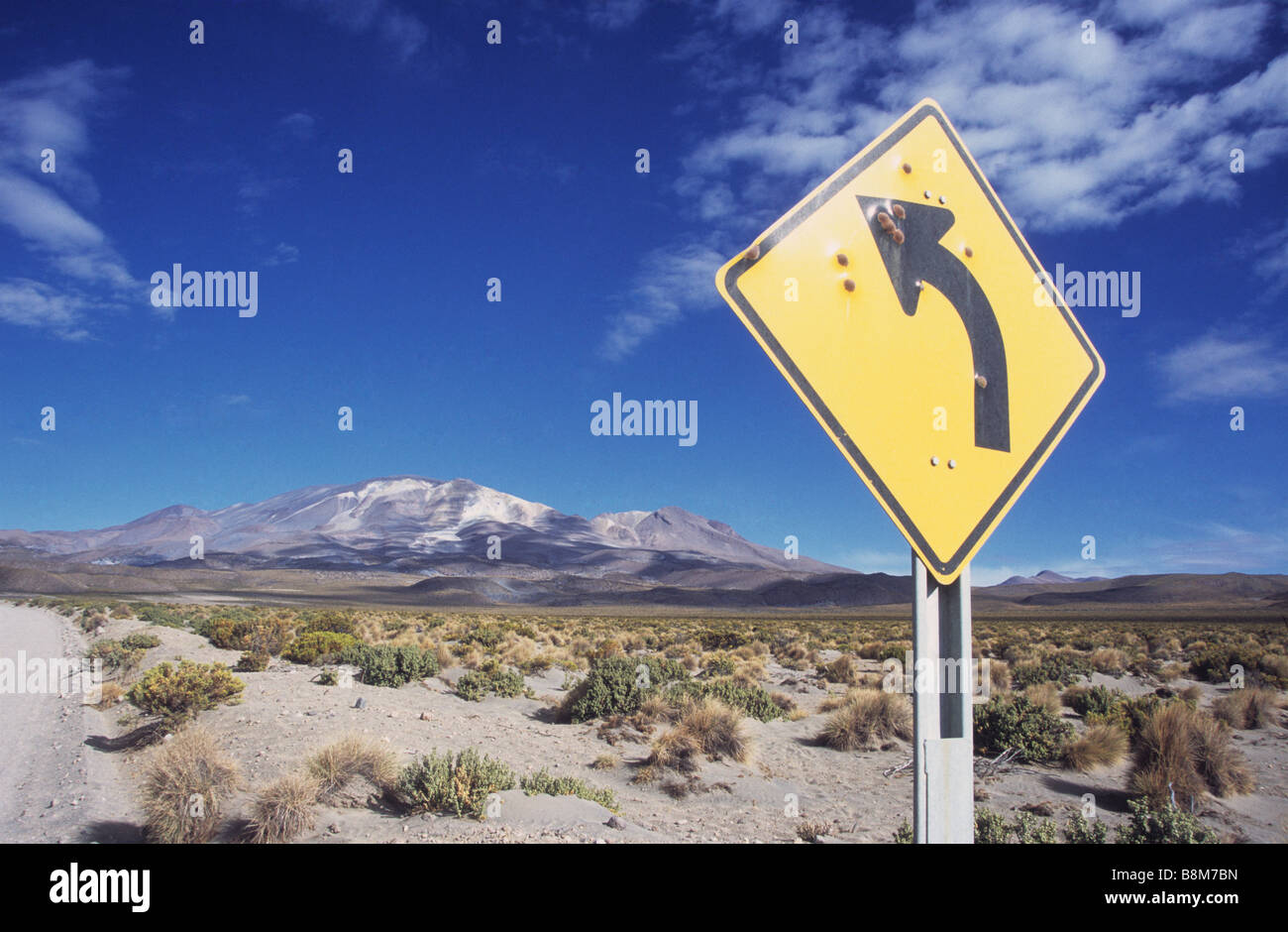 Road sign and Isluga volcano, Isluga National Park, Chile Stock Photo ...