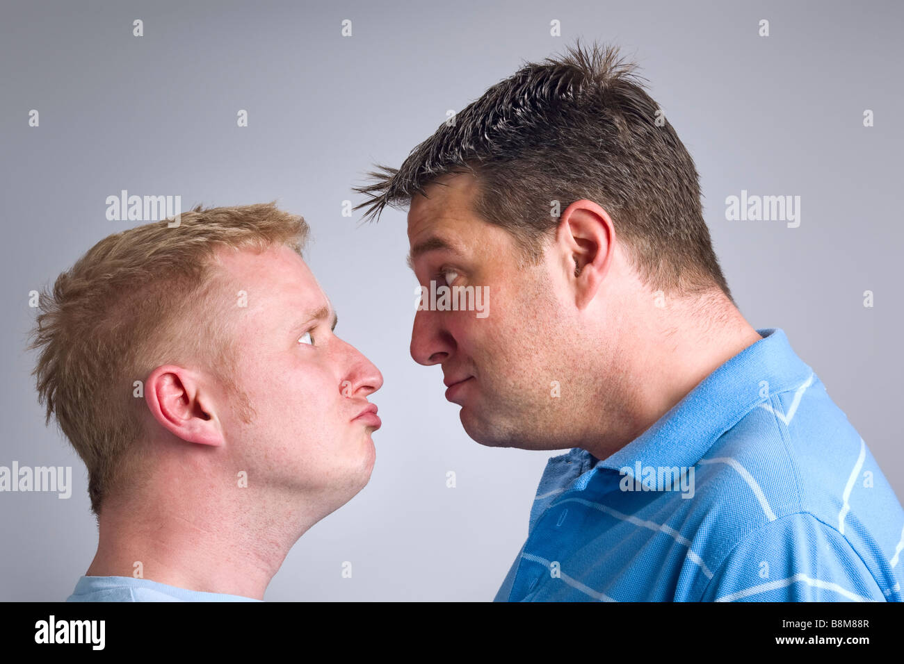 Two men eyeballing each other Stock Photo - Alamy