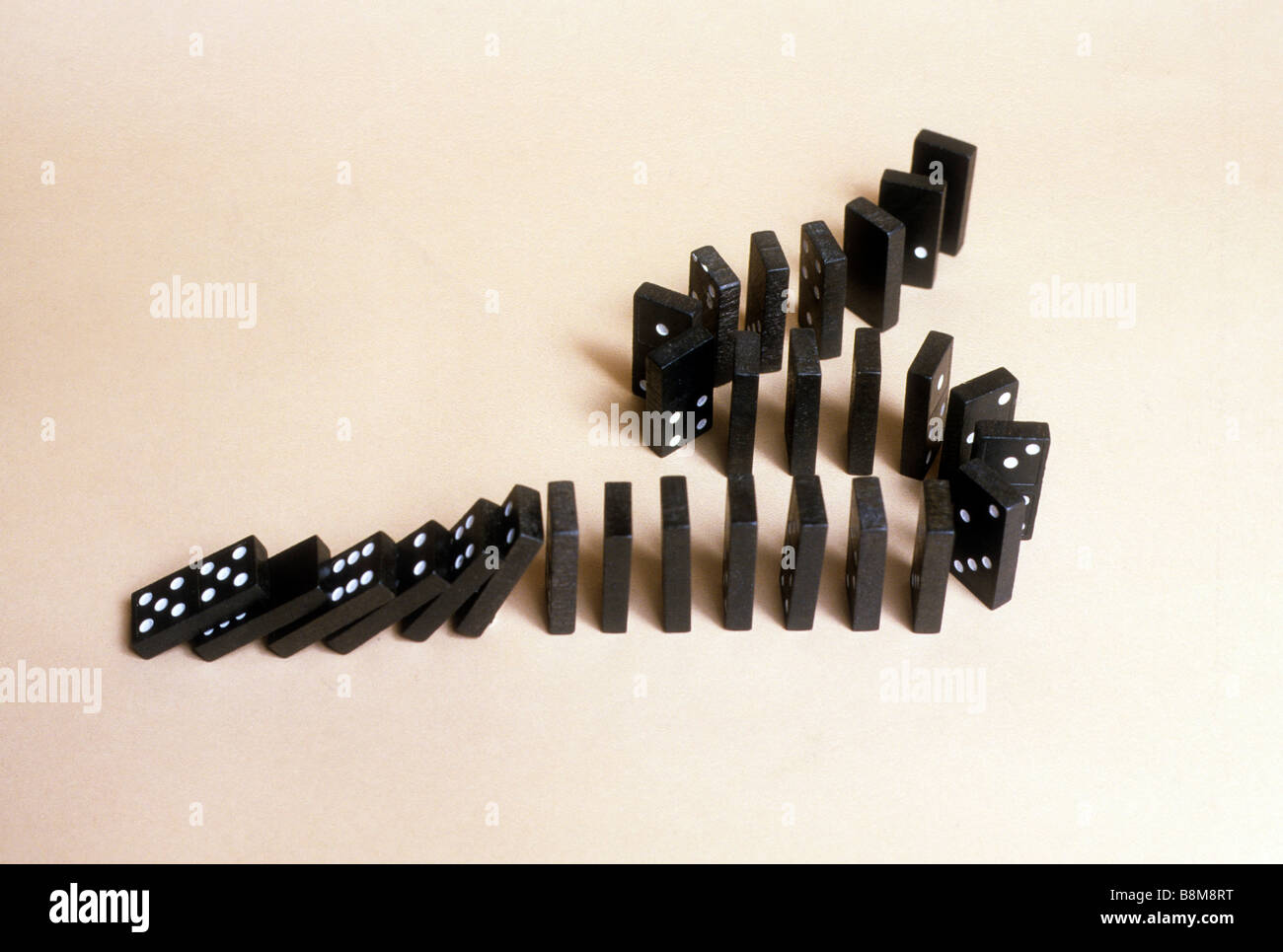 Cause and effect domino hi-res stock photography and images - Alamy