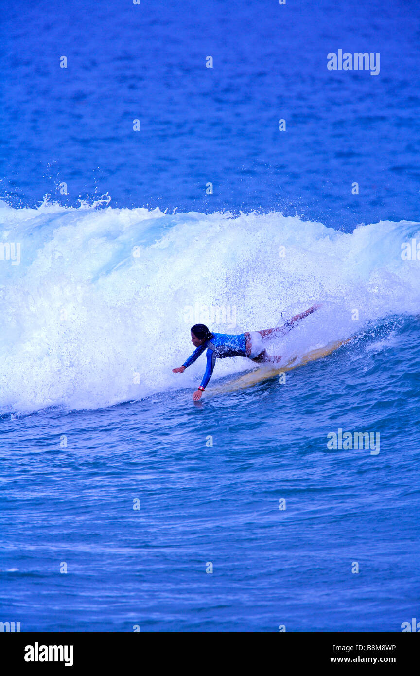 Young woman surfer fighting against huge wave at sea Stock Photo - Alamy