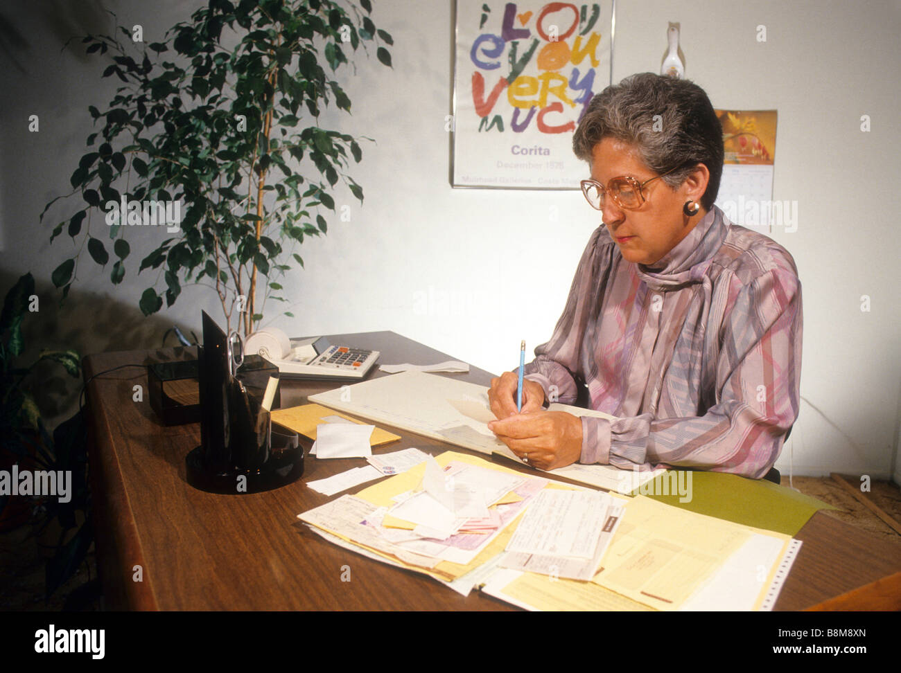 Hispanic woman secretary works in office bookkeeper account balance ...