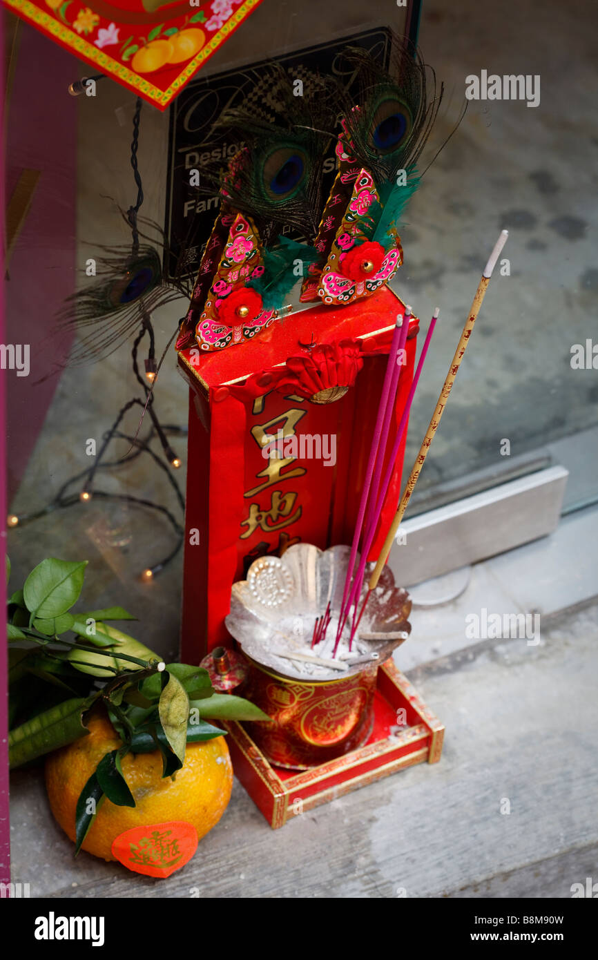 Offering offerings shrine religious hi-res stock photography and images ...