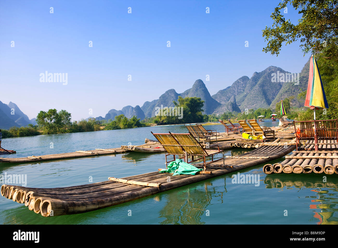 China Guangxi Province Guilin Yangshuo bamboo rafts on the Yulong River ...
