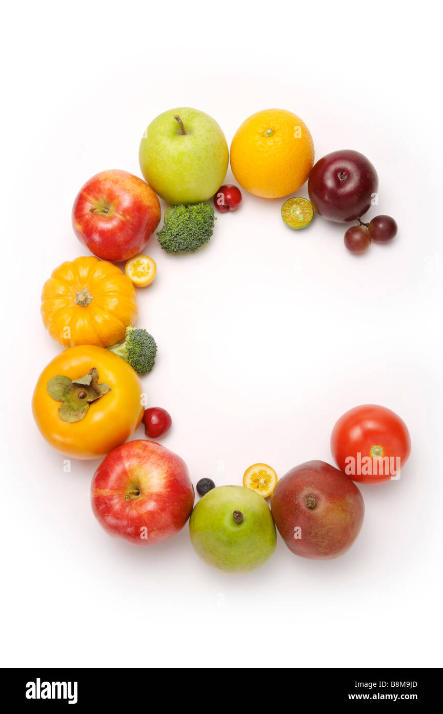 Fruits and vegetables in the shape of letter C close up Stock Photo - Alamy
