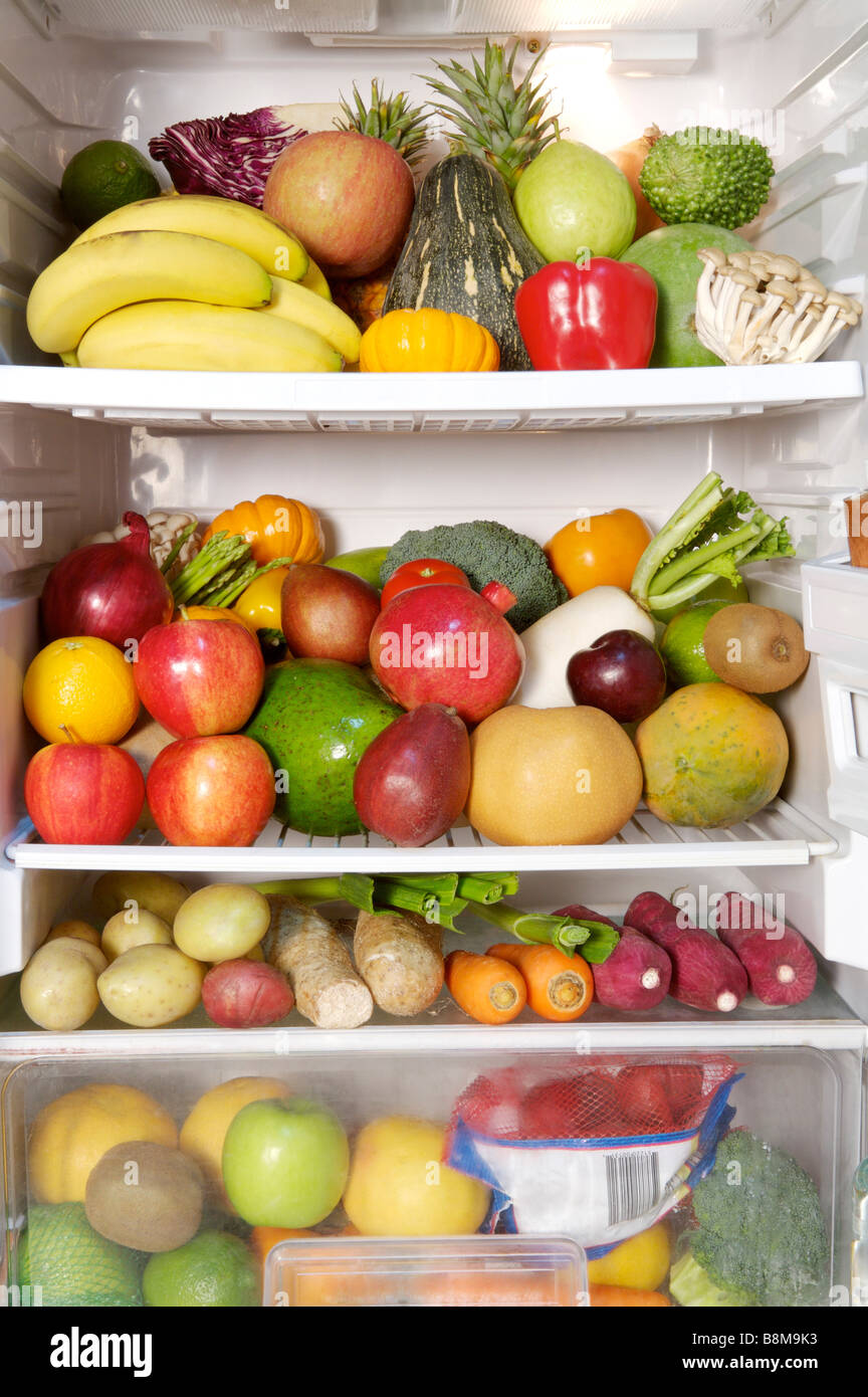 Close up of a stack of fruits and vegetables in the refrigerator Stock ...